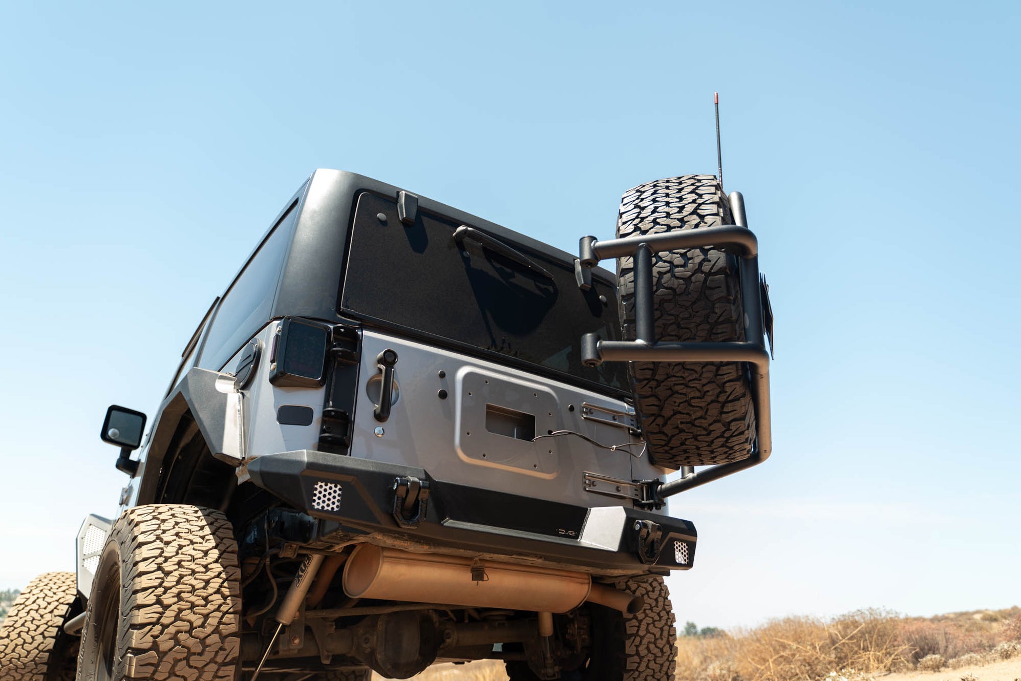 Jeep Wrangler JK Body Mounted Tire Carrier | DV8 Offroad